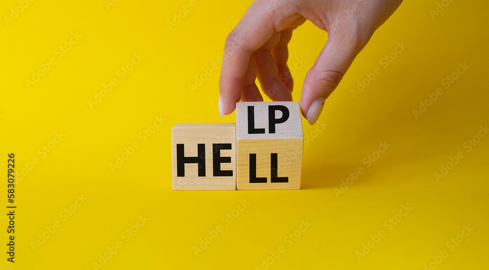 Help vs Hell symbol. Businessman hand Turnes cube and changes word Hell ...