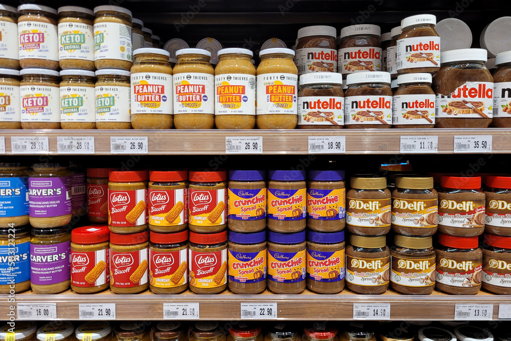 Kuala Lumpur, Malaysia - 12 Mar 2023: View of Various type chocolate spreads and peanut jam on ...