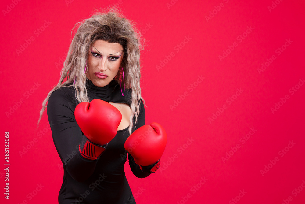 Transgender person with boxing gloves and agressive pose Stock Photo ...
