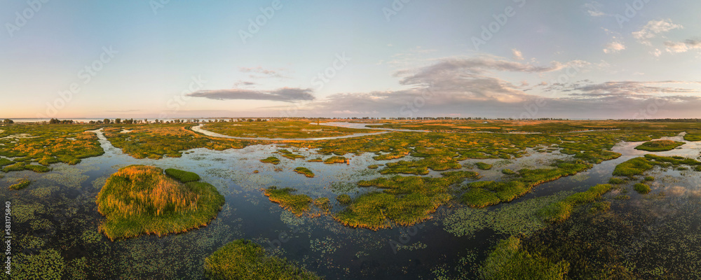 Aerial panoramic sunset sunrise scene at swamps and wetlands of Big ...