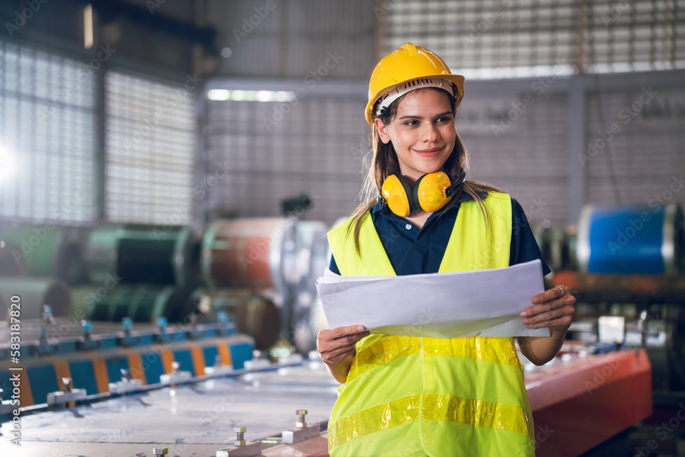 Confident caucasian engineering woman factory worker wearing safety ...