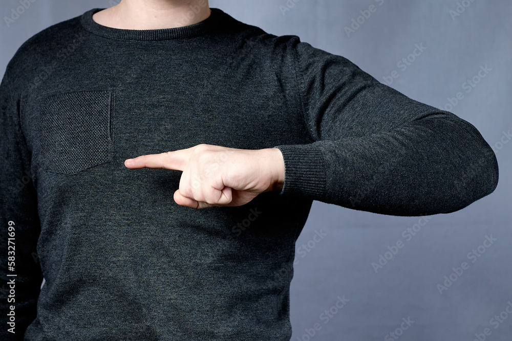 Hand with index finger showing direction to right. Directional or ...