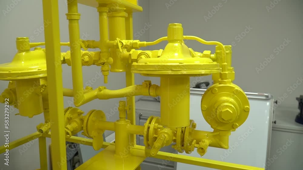 Boiler room with pipes, valves and sensors.Manometer, pipes and faucet ...