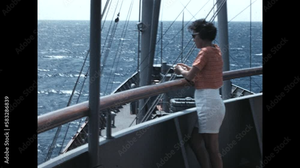 USS Geiger Transport 1962 - A woman stands on the deck of a naval ...