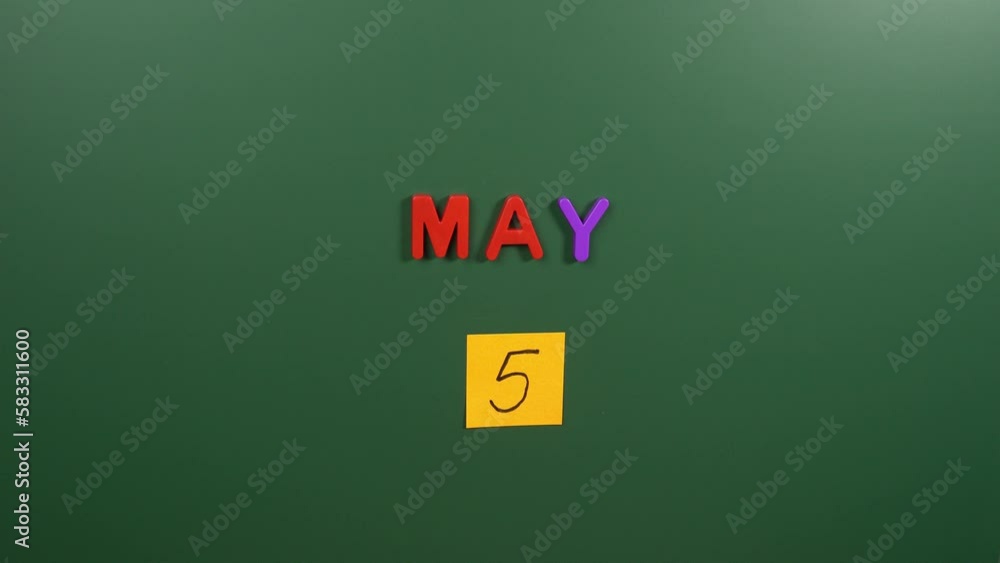 Video „Hand sticking a sticker 5 May calendar day on school board. 5 ...