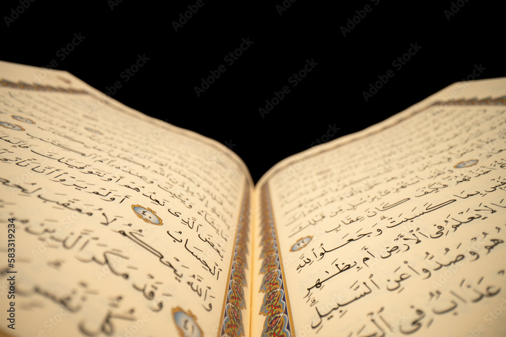Islamic concept - The Holy Al Quran with written Arabic calligraphy ...