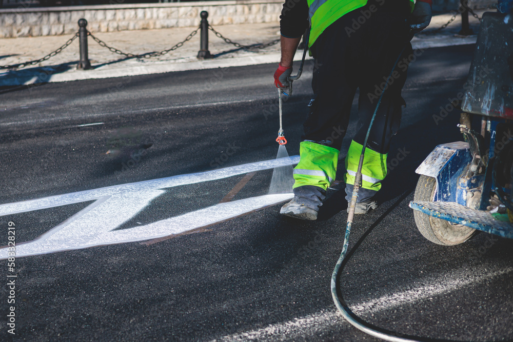 Process of making new road surface markings with a line striping ...