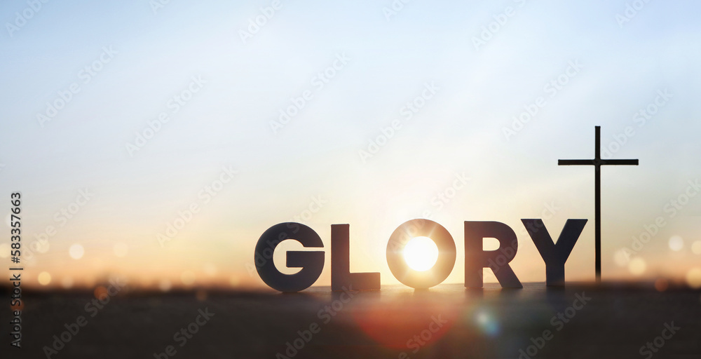 GLORY lettering with bright sunlight, the cross of Jesus Christ and ...