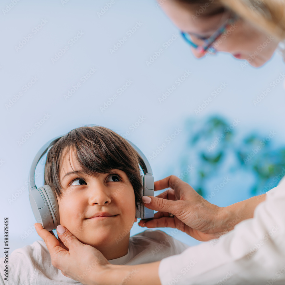 Boy Having Pure Tone Audiometry Test at Audiology Office. Stock Photo ...