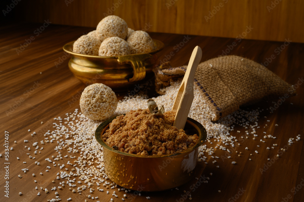 Amaranth ladoo or Rajgira laddu or Cholai ke laddo in brass bowl with ...