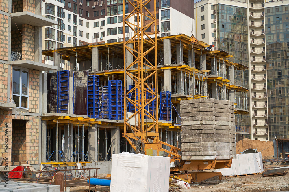 Construction site. High rise Building under construction. Construction ...