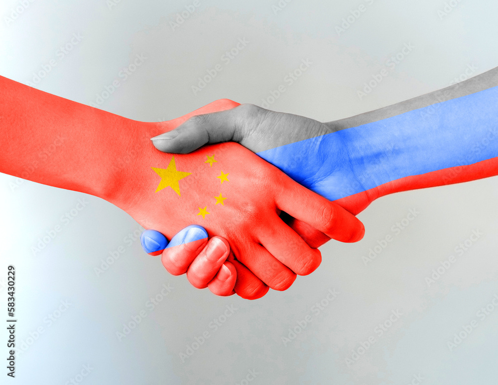 Handshake symbol in the colors of the national flags of China and ...