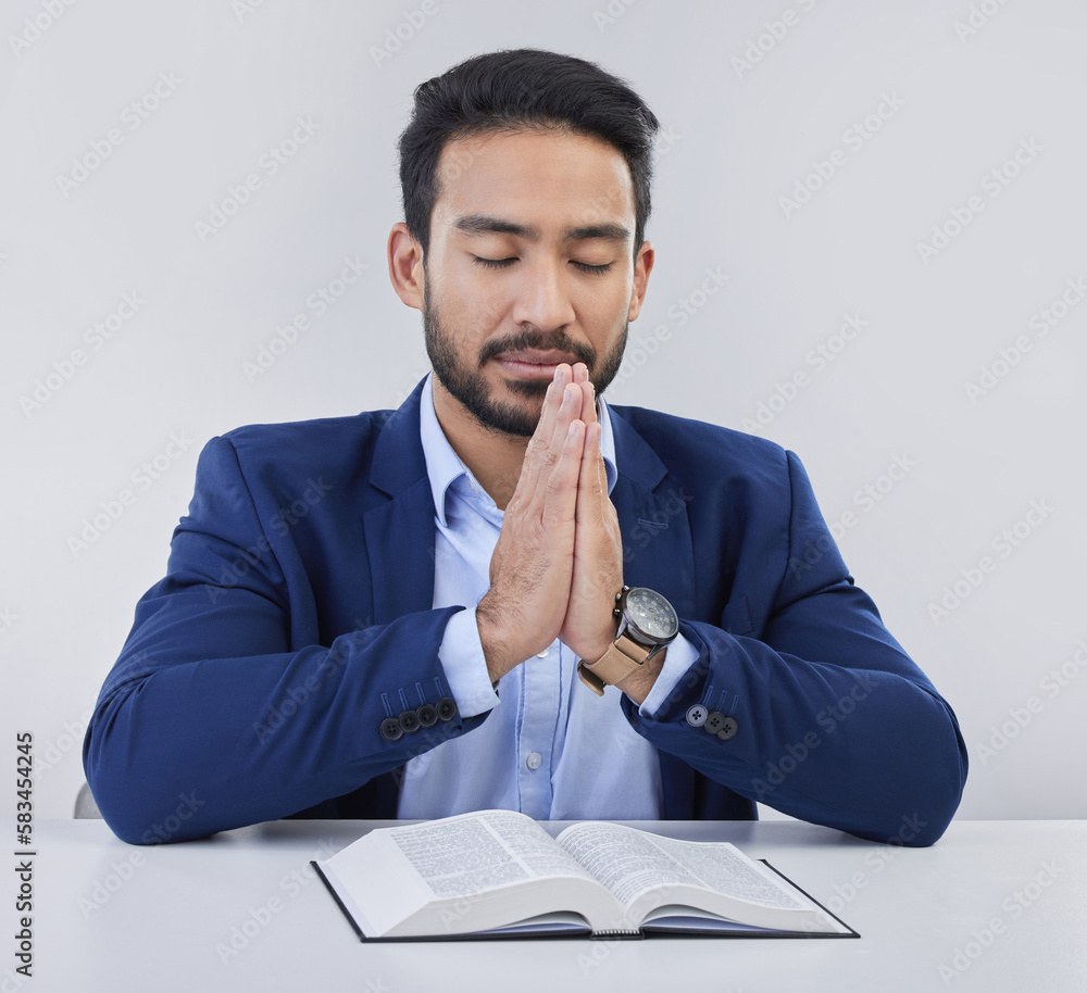Mockup, faith and Asian man, praying, bible and guidance against grey ...