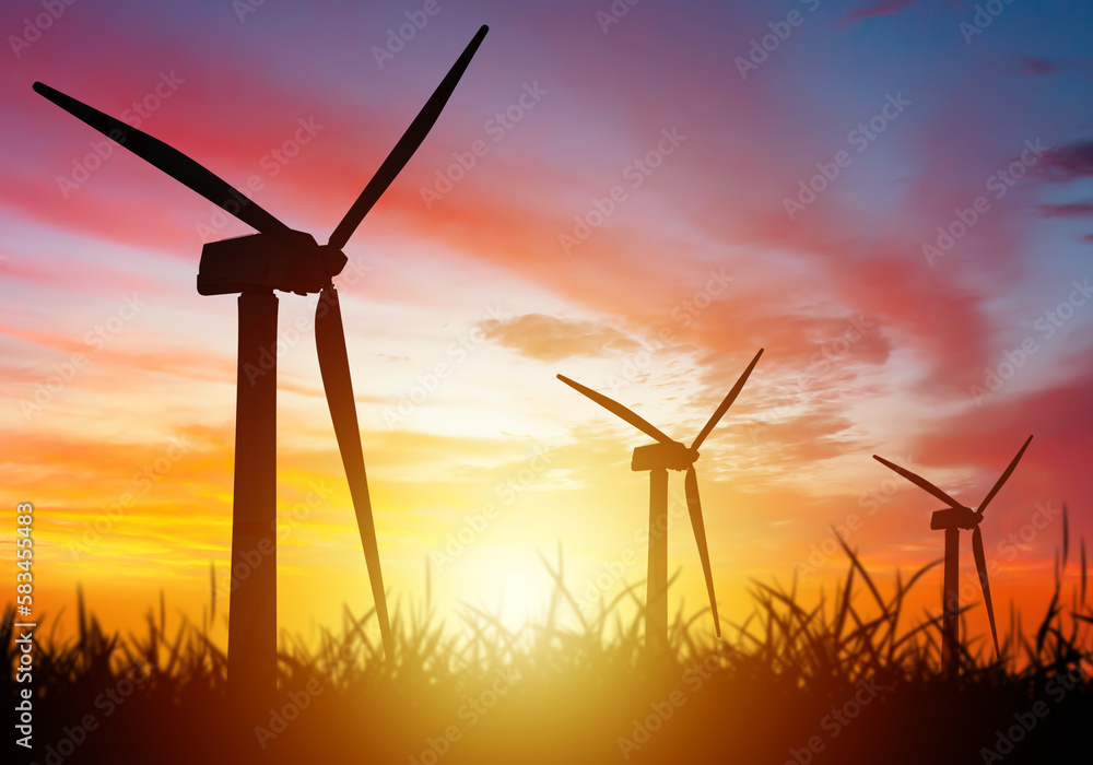 Wind turbines at sunset. Ecological landscape. Windmills in evening ...