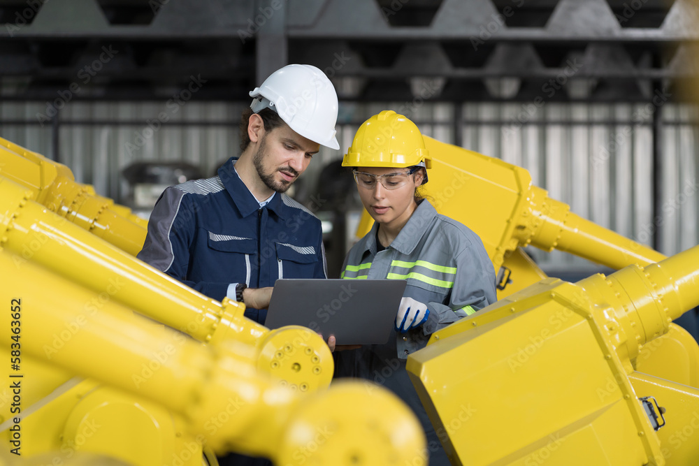 Foto de Industrial Manufacturing Robotic Arms Maintaining. Male, female ...