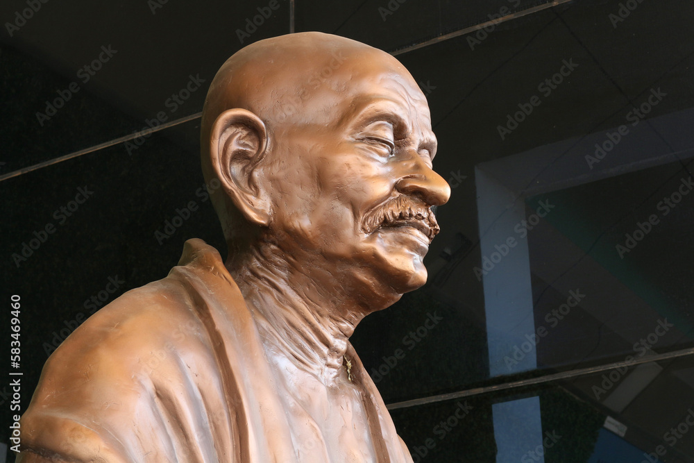 Portrait of Mahatma Gandhi. A sculpture of India's national hero Gandhi ...