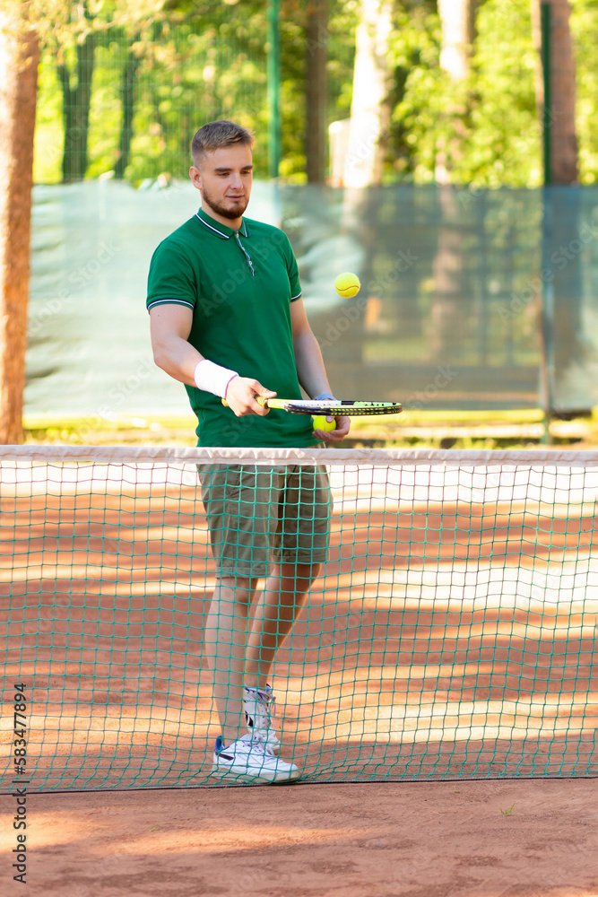 athlete man playing tennis on court on match. Male player with racket ...