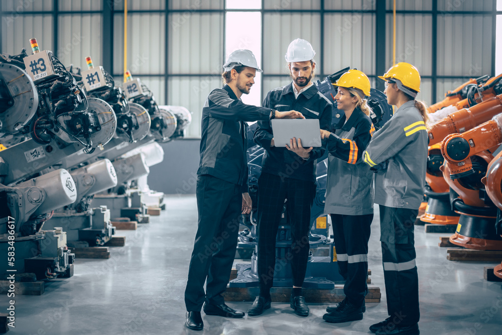 Group of engineer team stand talking together. Industry engineering ...