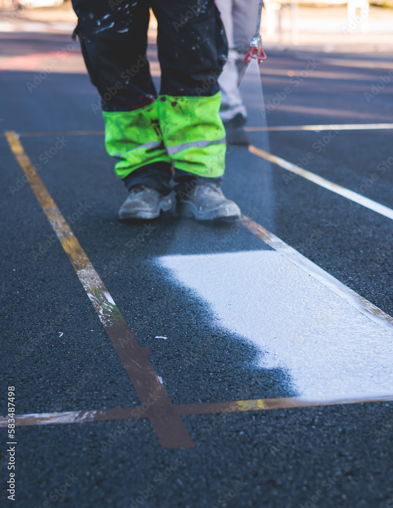 Process of making new road surface markings with a line striping ...