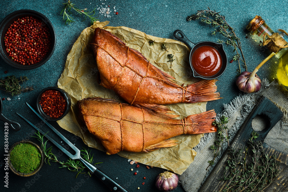 Smoked fish red sea bass. Sea bass closeup. Delicious seafood for ...