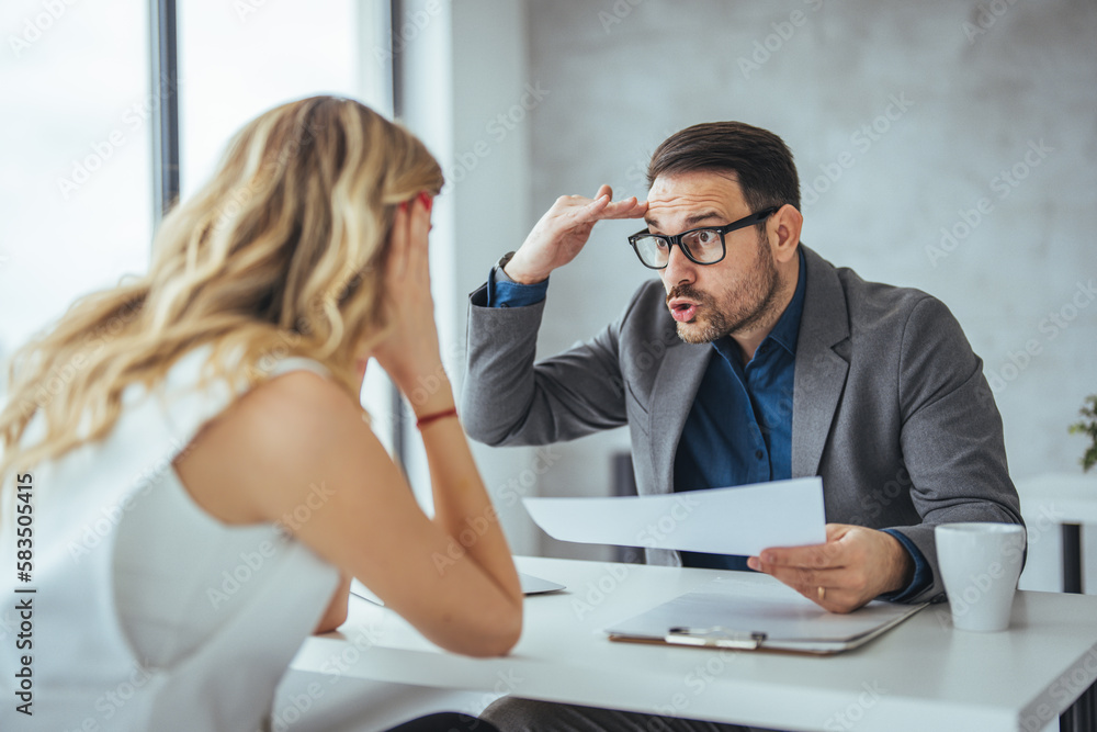 Irritated businessman holding paper, disagrees with bad contract terms ...