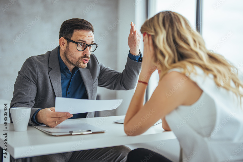 Manager is hard talking with employee in an office. Businessmen arguing ...