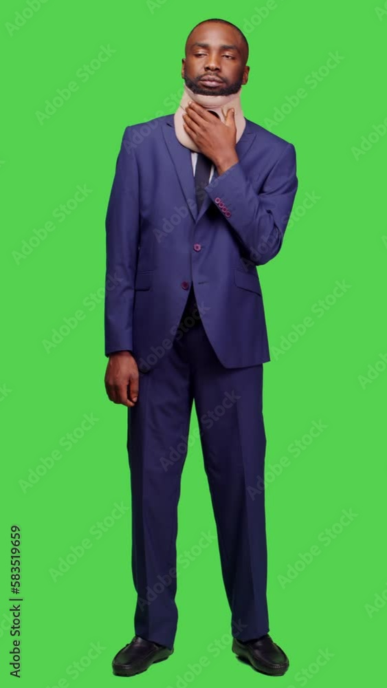 Vertical video: Front view of injured businessman wearing suit and ...