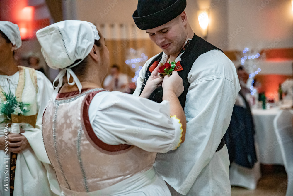 Slovak folk dance traditional wedding. Young groom and bride in ...