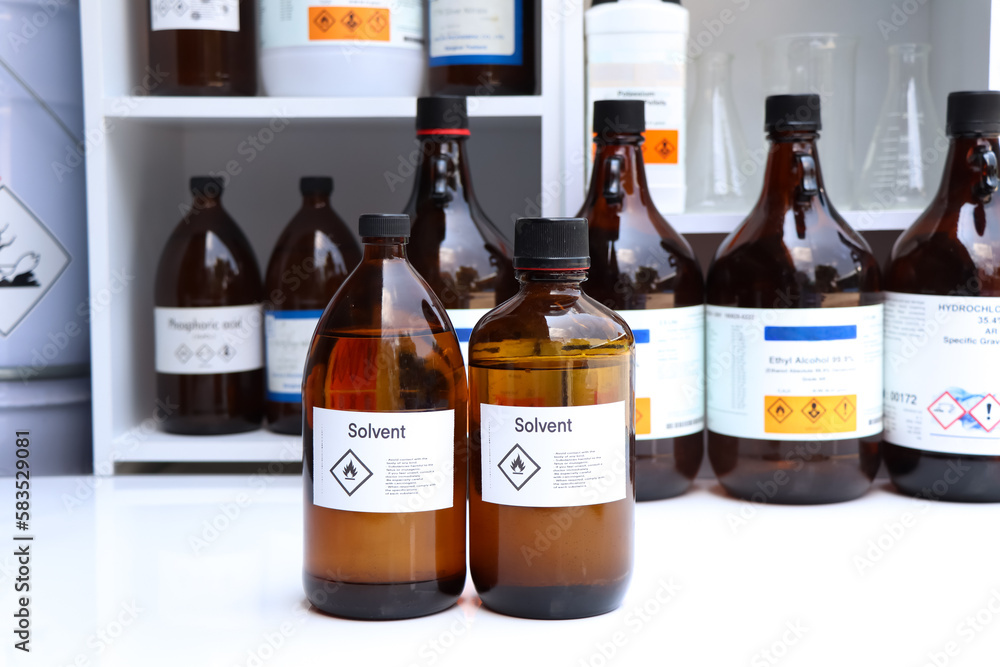 Solvent in glass,Hazardous chemicals and symbols on containers Stock ...