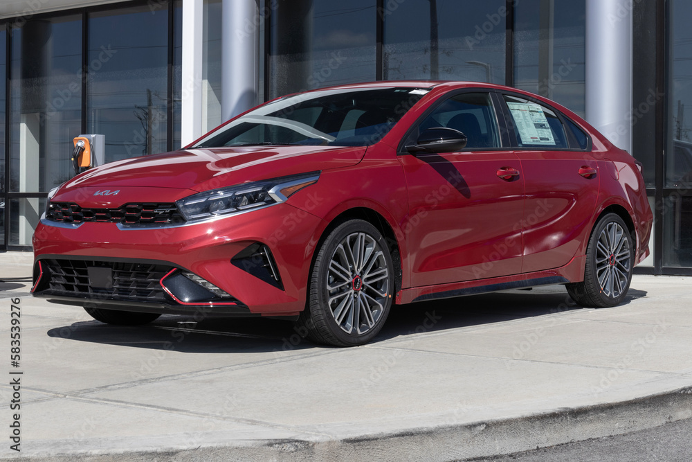 Kia Forte display at a dealership. Kia offers the Forte in LX, LXS, GT ...