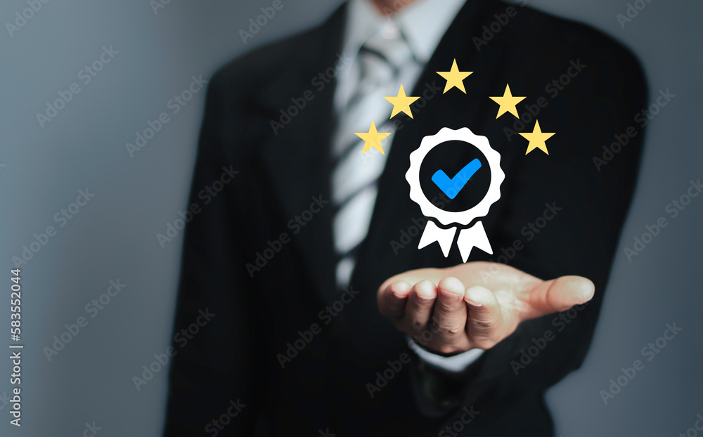 Hand showing the symbol of leading service Quality assurance, Guarantee ...