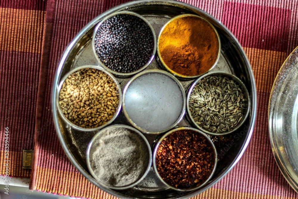 Top view of an Indian traditional masala box with various spices Stock ...