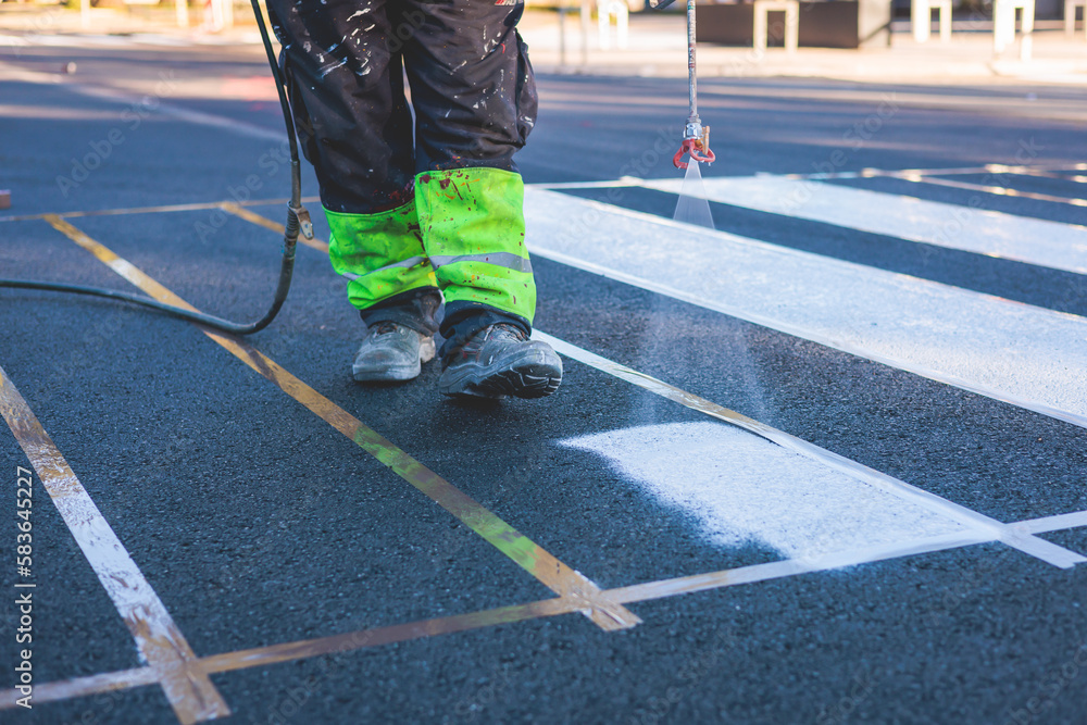 Process of making new road surface markings with a line striping ...