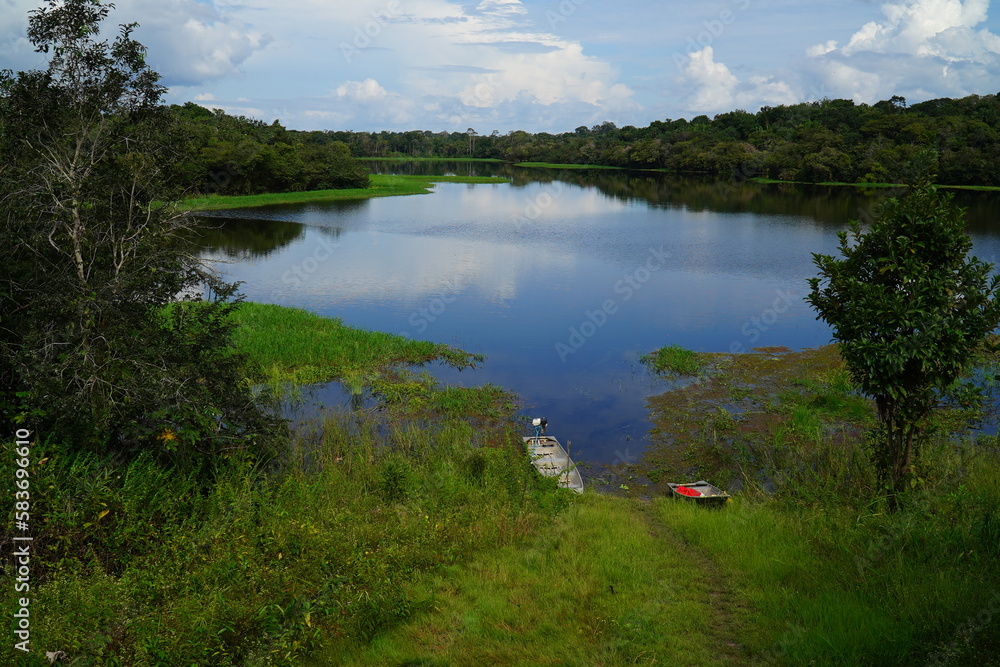 View over the Parana Marmori lake from the village of Terra de Caju ...