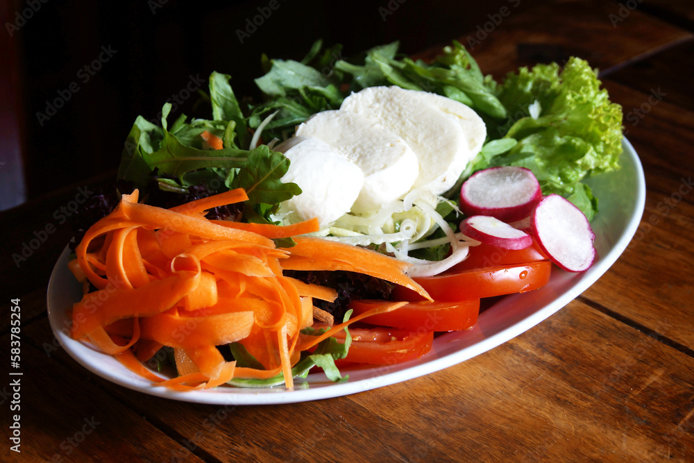 Burrata salad. The burrata is a fresh cow's milk cheese, with spun ...