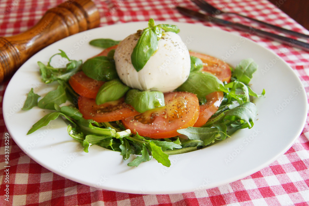 Burrata salad. The burrata is a fresh cow's milk cheese, with spun ...