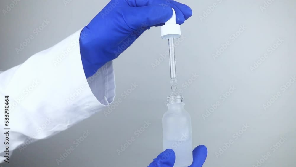 Niacinamide. Girl applies vitamin b3 to her face. Laboratory research ...