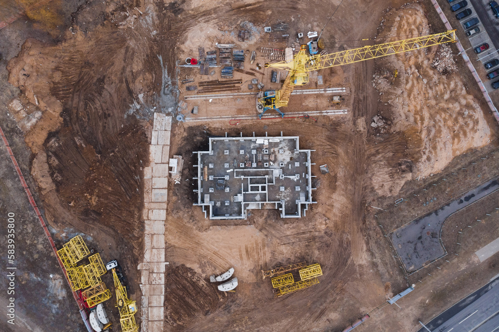 Construction site, top view, building foundation, tower crane at the ...