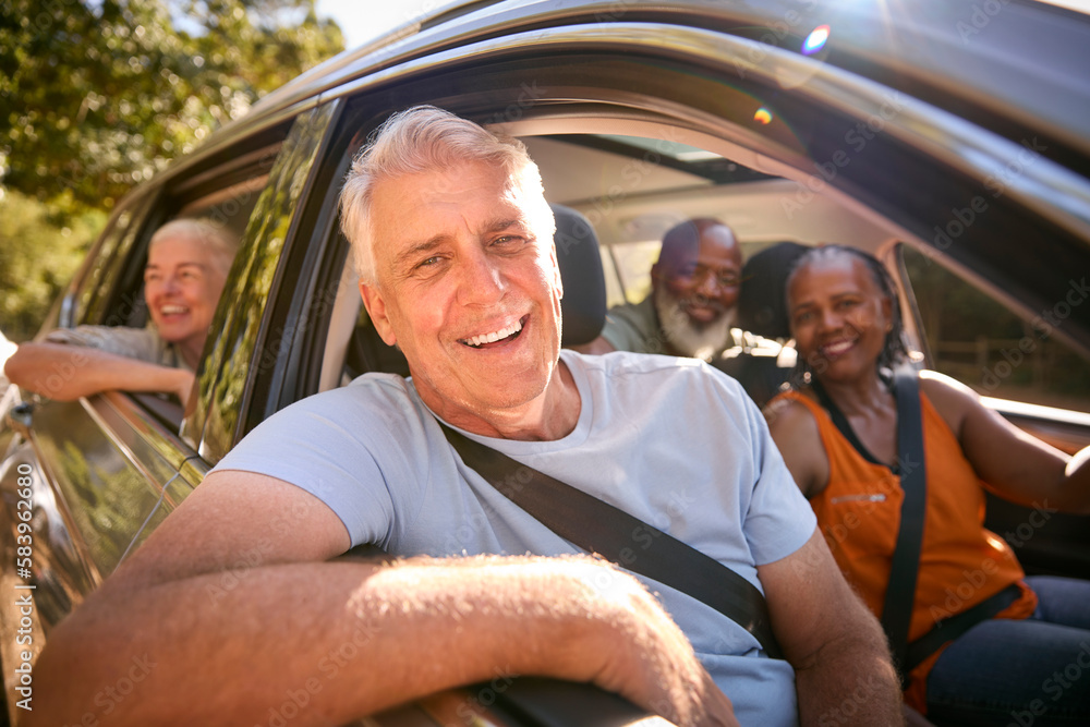 Portrait Of Group Of Senior Friends Enjoying Day Trip Out Driving In ...