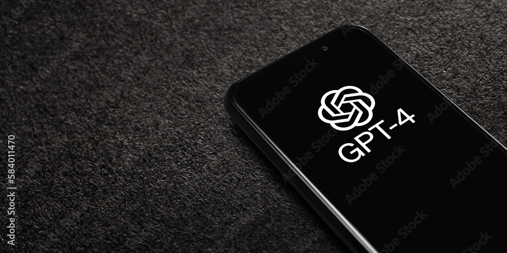 GPT-4 logo on screen smartphone on black textured background. GPT-4 is ...