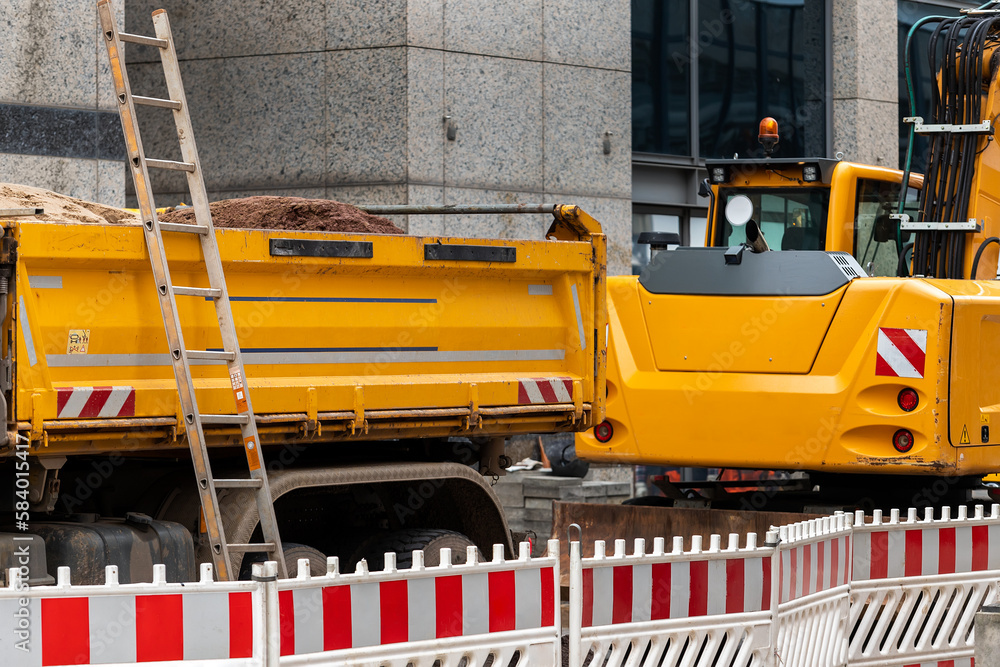 Sity street renovation rebuilding construction site with dump truck ...
