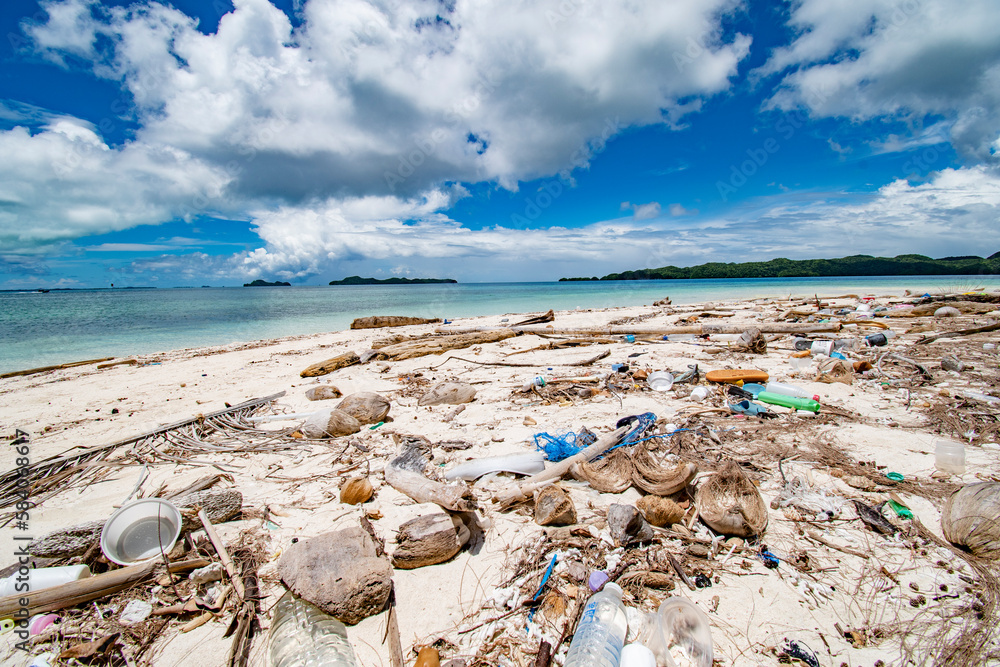 Plastic pollution, Many plastic debris on the beautiful tropical beach ...