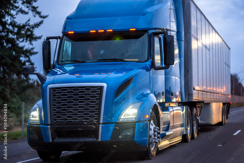 Photo & Art Print First drops of rain in the beams of the headlights of ...