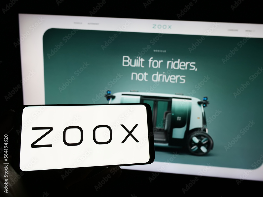 Stuttgart, Germany - 03-19-2023: Person holding mobile phone with logo ...