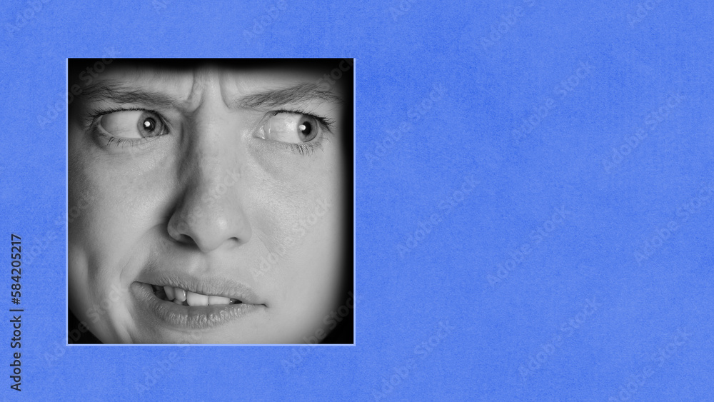 Emotive female face against blue background. Questioning, awkward ...