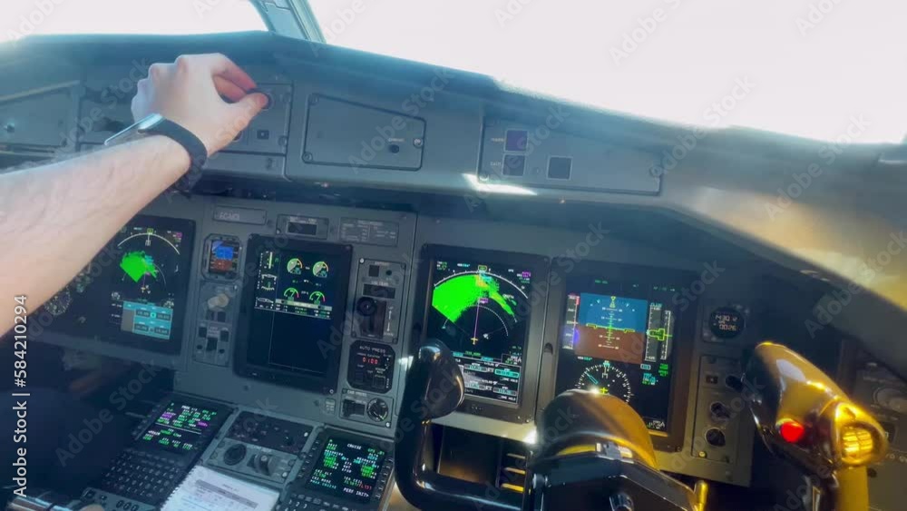 Video Stock First person view of a pilot adjusting the buttons in the ...