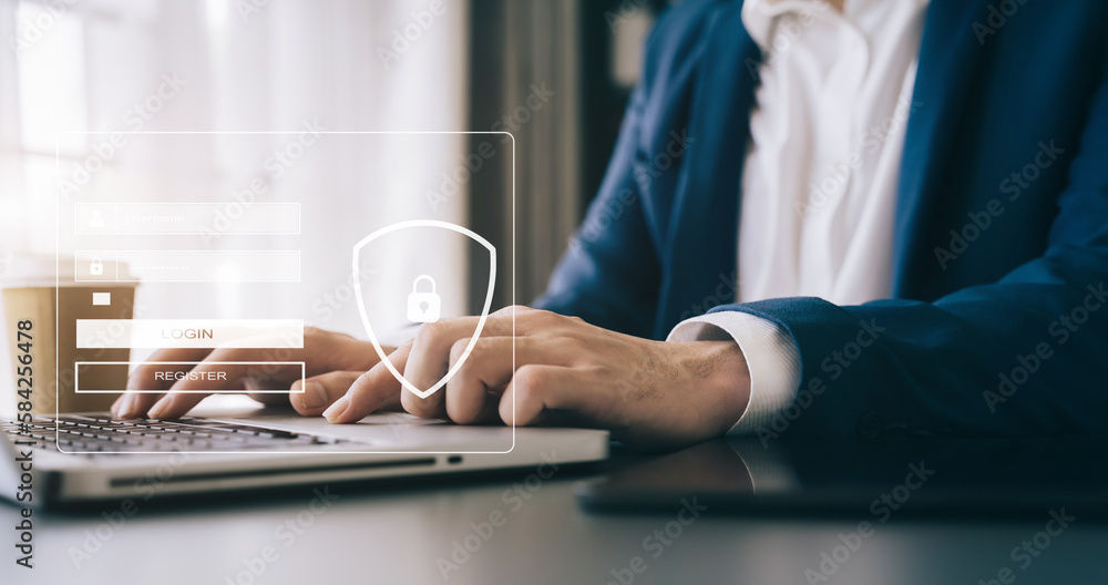 Businessman typing login and password in the concept of cyber security ...