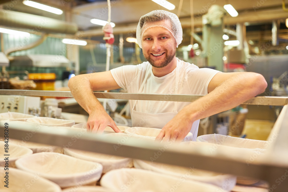 Baker apprentice in training baking bread Stock Photo | Adobe Stock