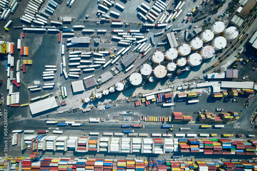 Stacked cargo containers and gas tanks top down aerial view. Containers ...