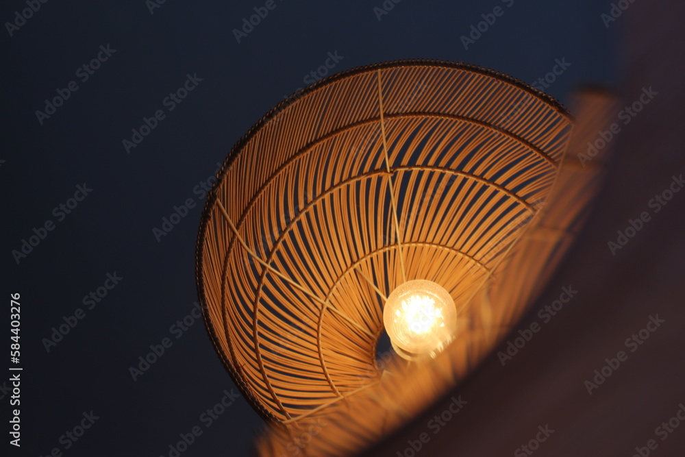 Light bulb and lampshade partially reflected against a mirror. Concept ...